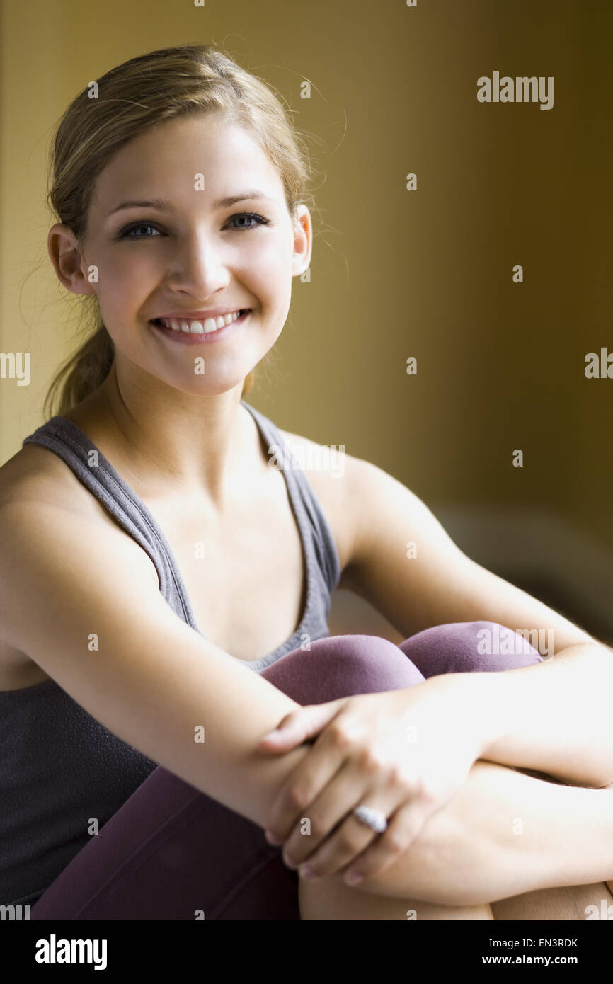 Arms around knees hi-res stock photography and images - Alamy