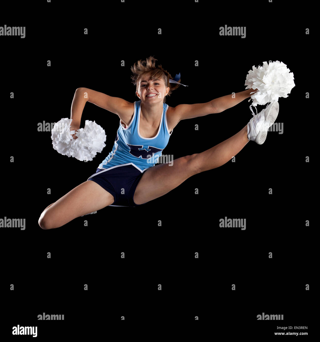 Cheerleader jumping hi-res stock photography and images - Alamy