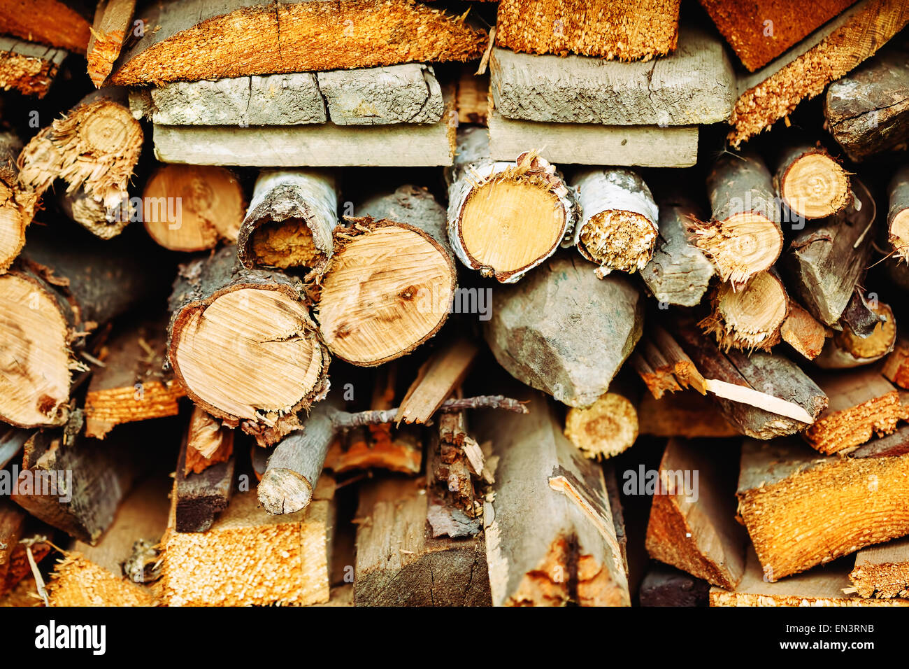 Stacked wood timber for construction. Background with logs Stock Photo ...