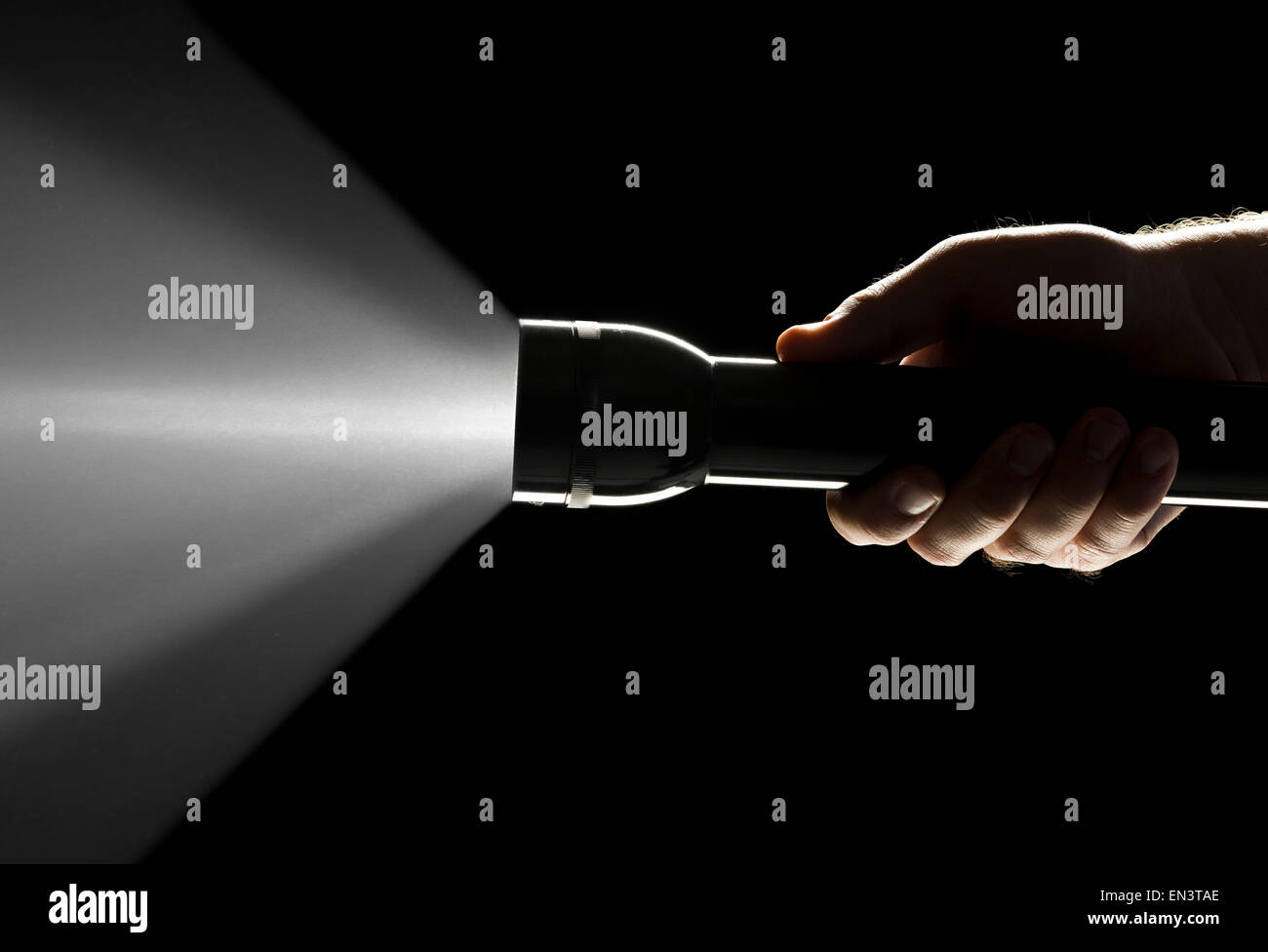 hand holding a flashlight Stock Photo - Alamy