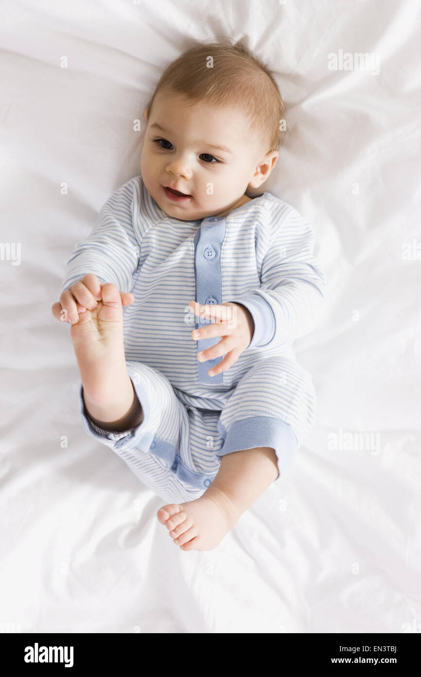 baby on a bed Stock Photo - Alamy