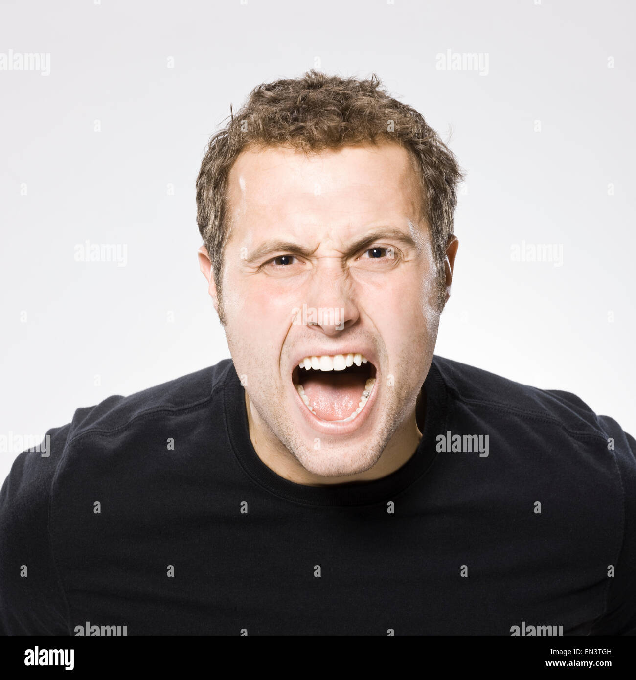 man screaming at the camera Stock Photo - Alamy