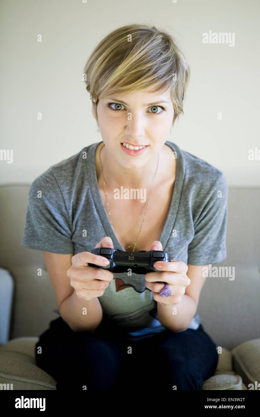 Blonde joystick holding game hi-res stock photography and images - Alamy