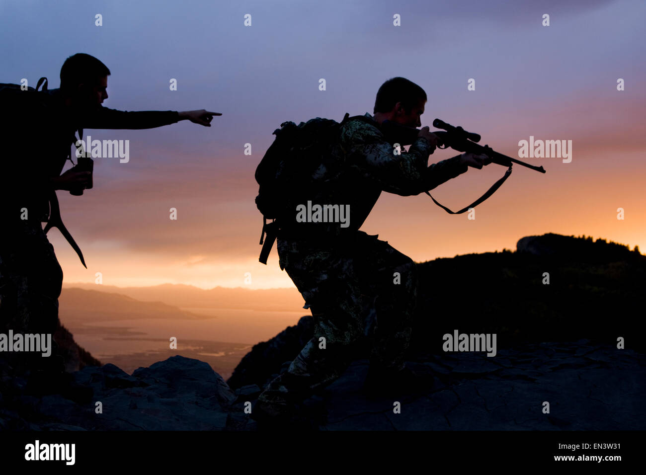 man hunting in the wilderness Stock Photo - Alamy