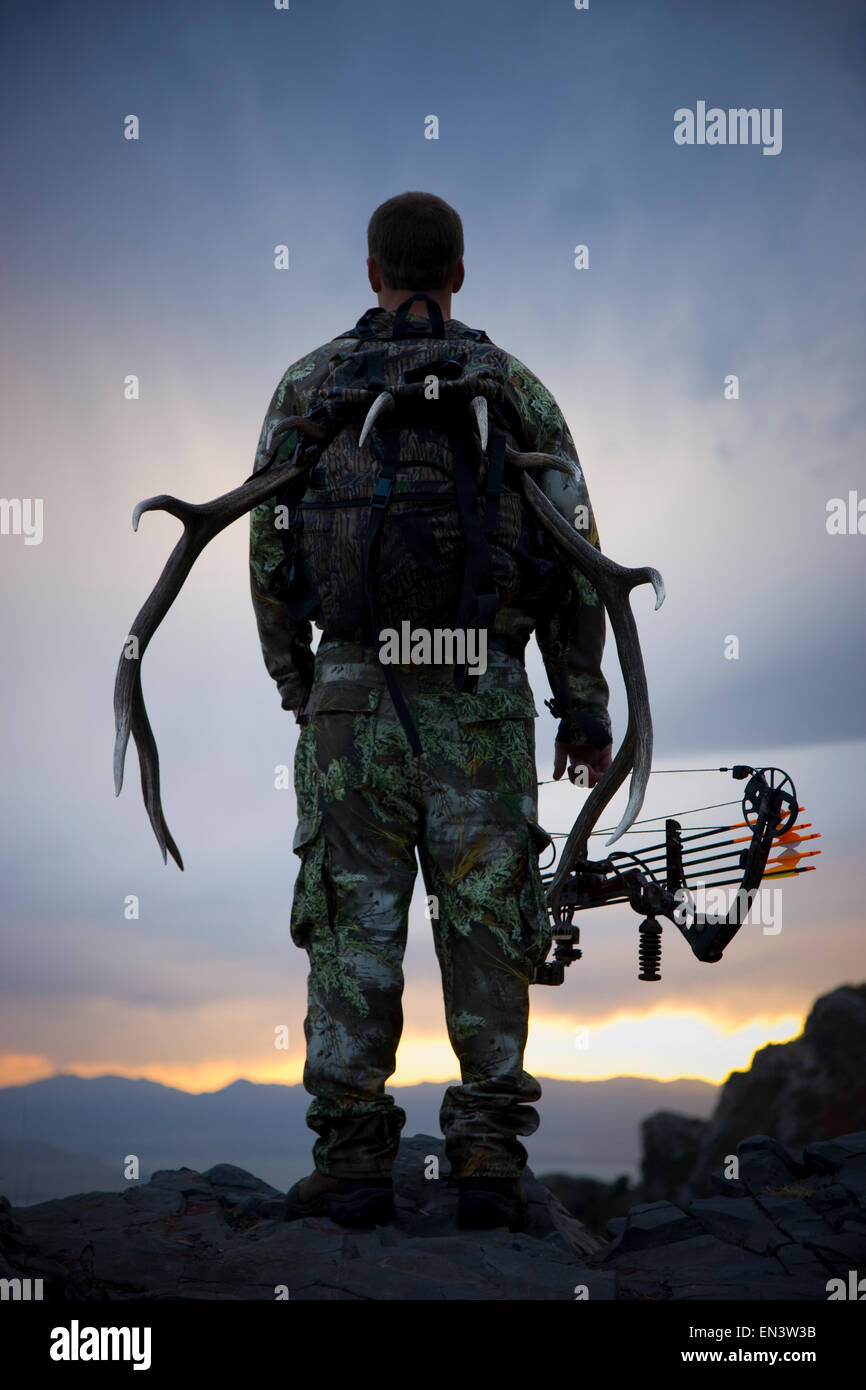 man hunting in the wilderness Stock Photo - Alamy