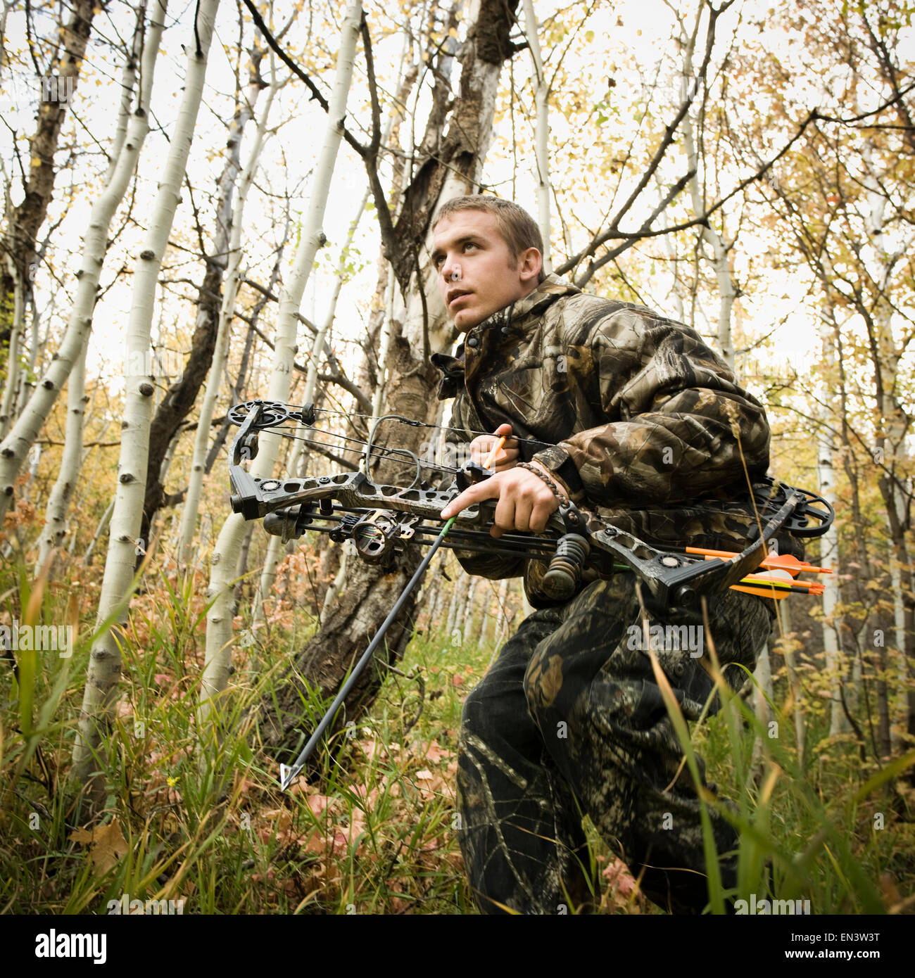 man hunting in the wilderness Stock Photo - Alamy
