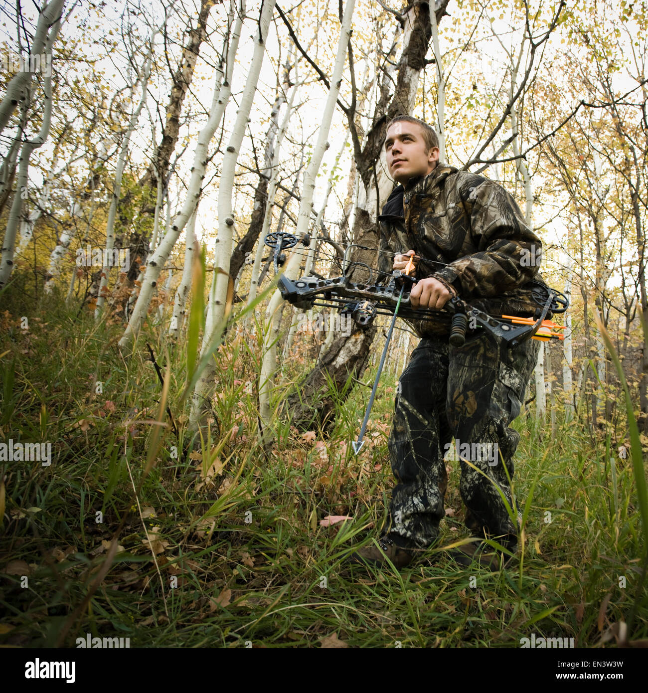 man hunting in the wilderness Stock Photo - Alamy