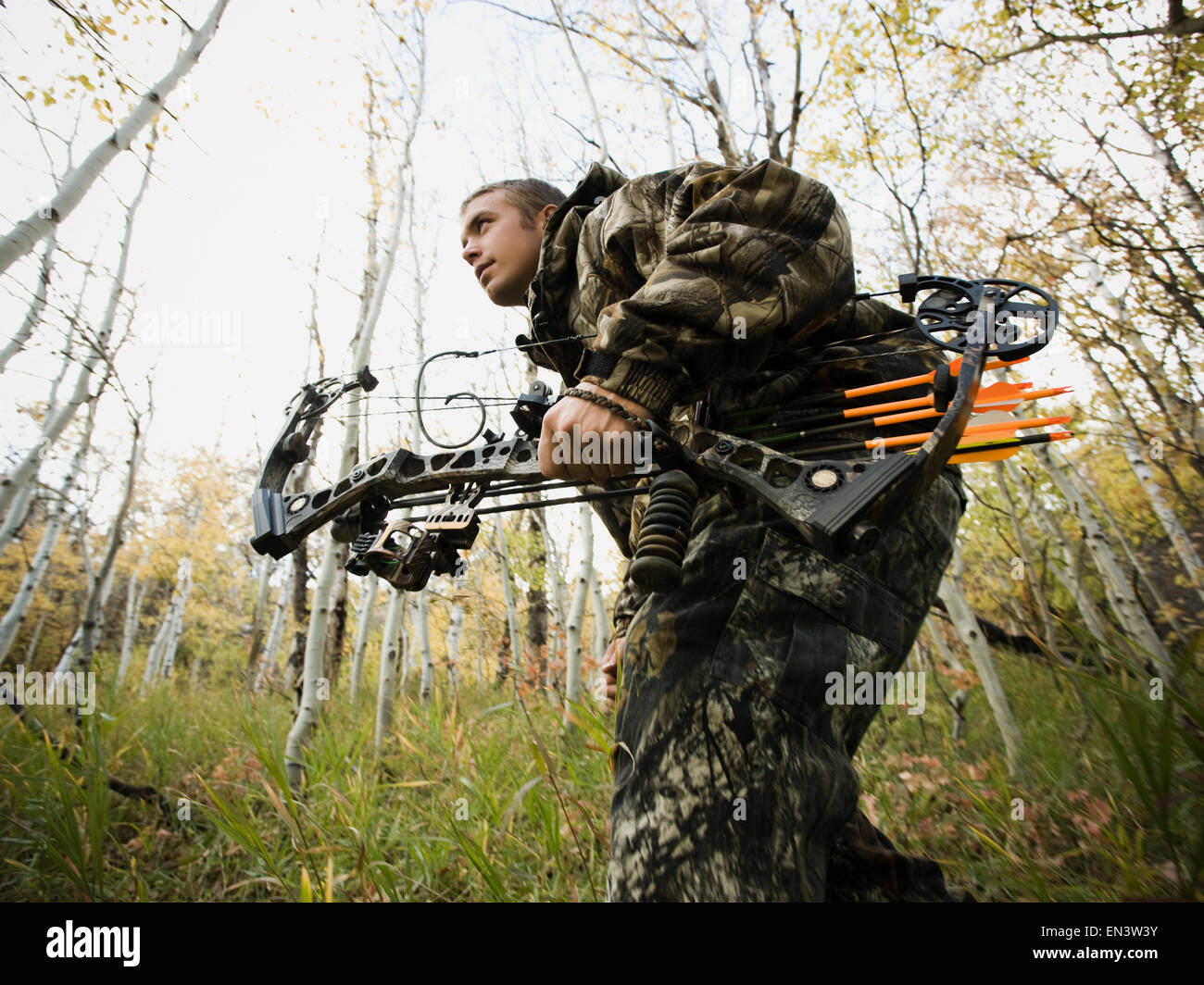 man hunting in the wilderness Stock Photo - Alamy