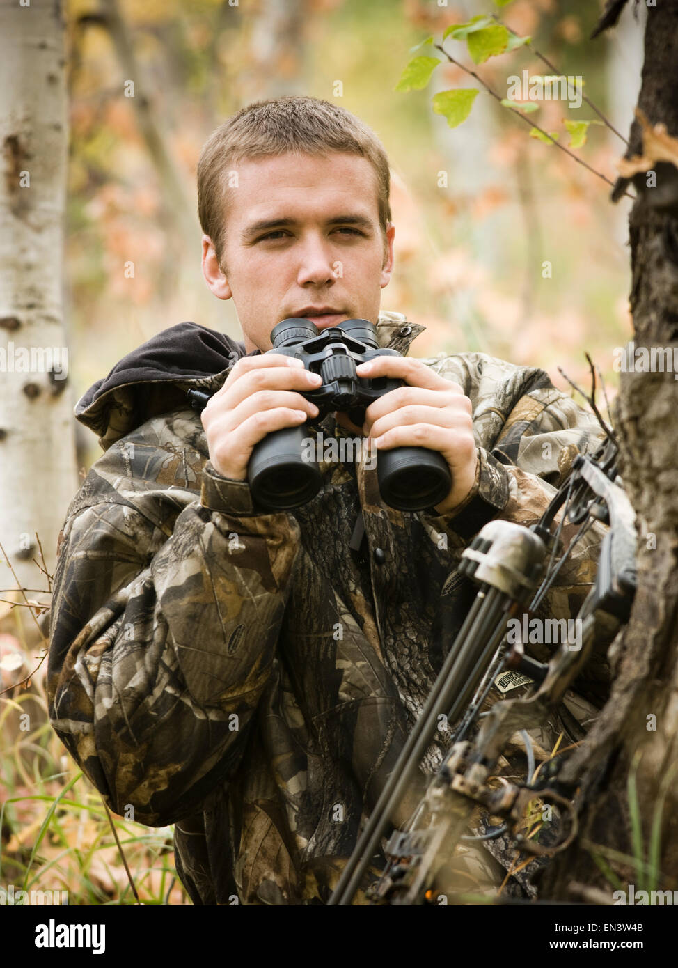 man hunting in the wilderness Stock Photo - Alamy