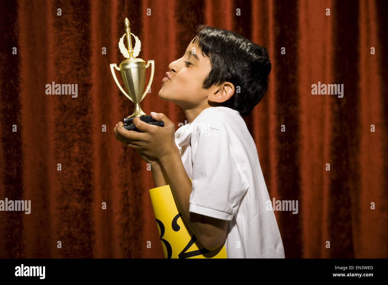 Boy kissing trophy cup Stock Photo - Alamy Boy kissing trophy cup Stock Photo - Alamy