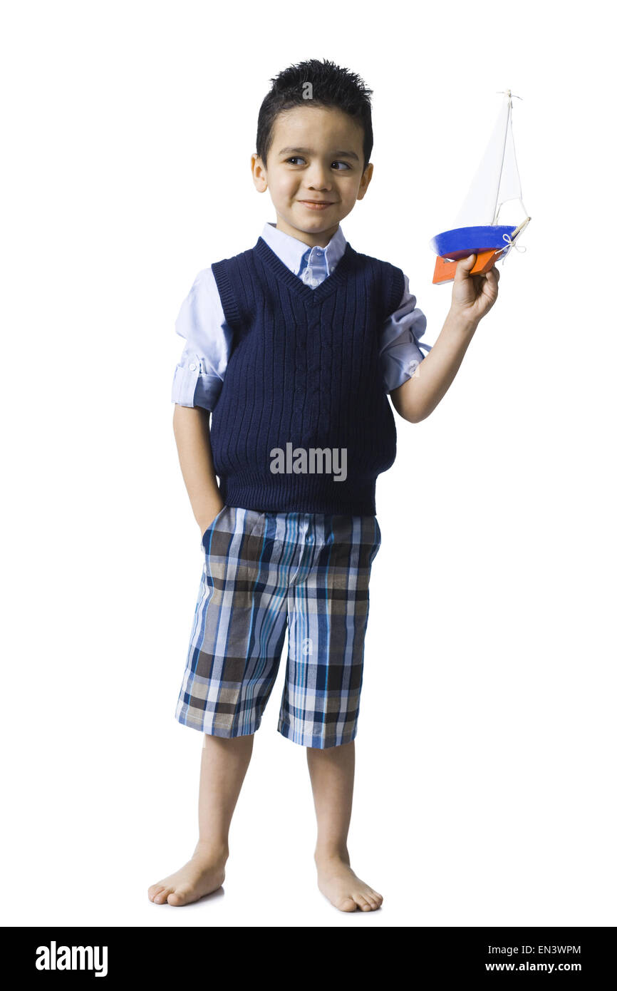 Boys with toy boat hi-res stock photography and images - Alamy