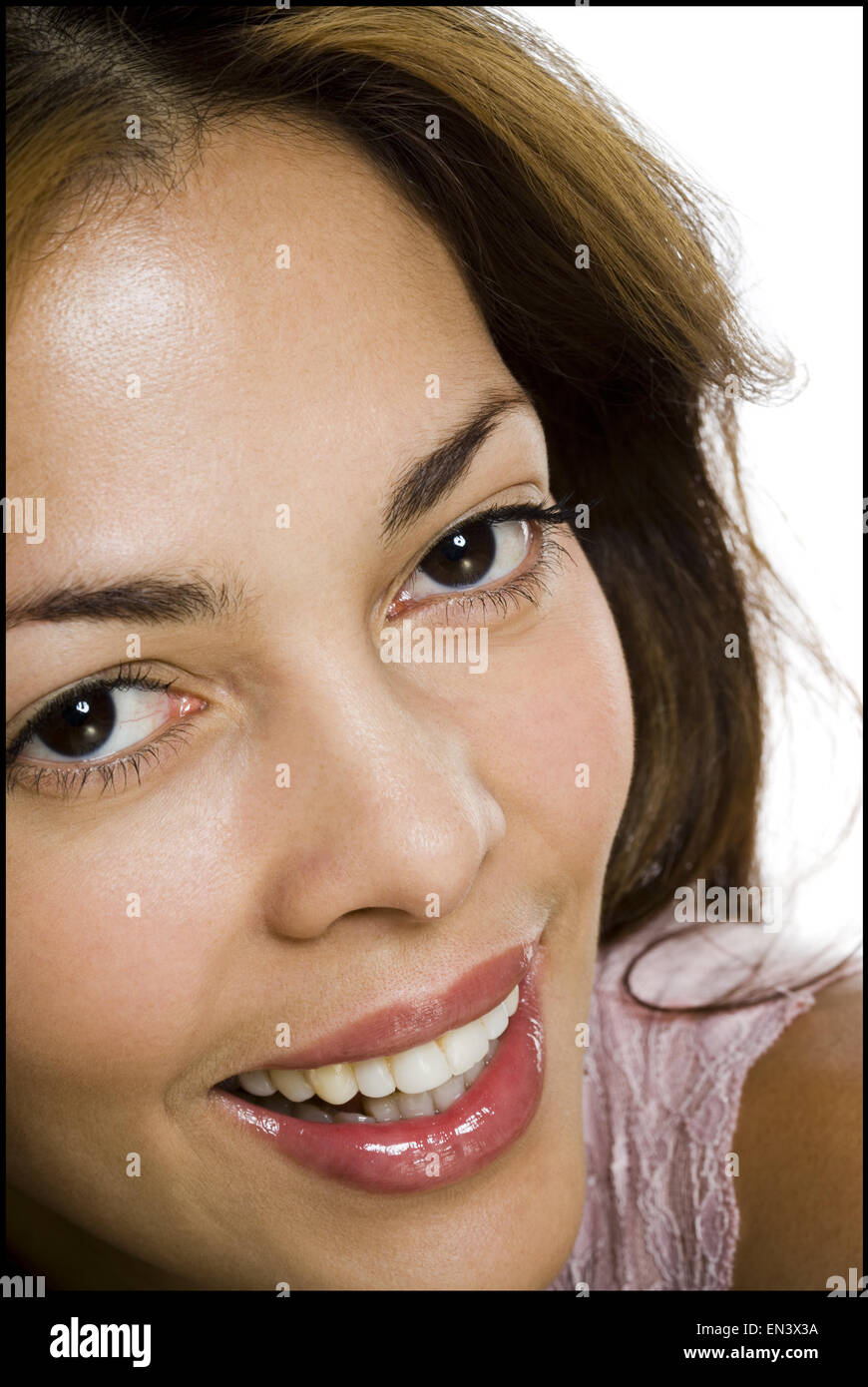 Closeup of woman looking up smiling Stock Photo - Alamy