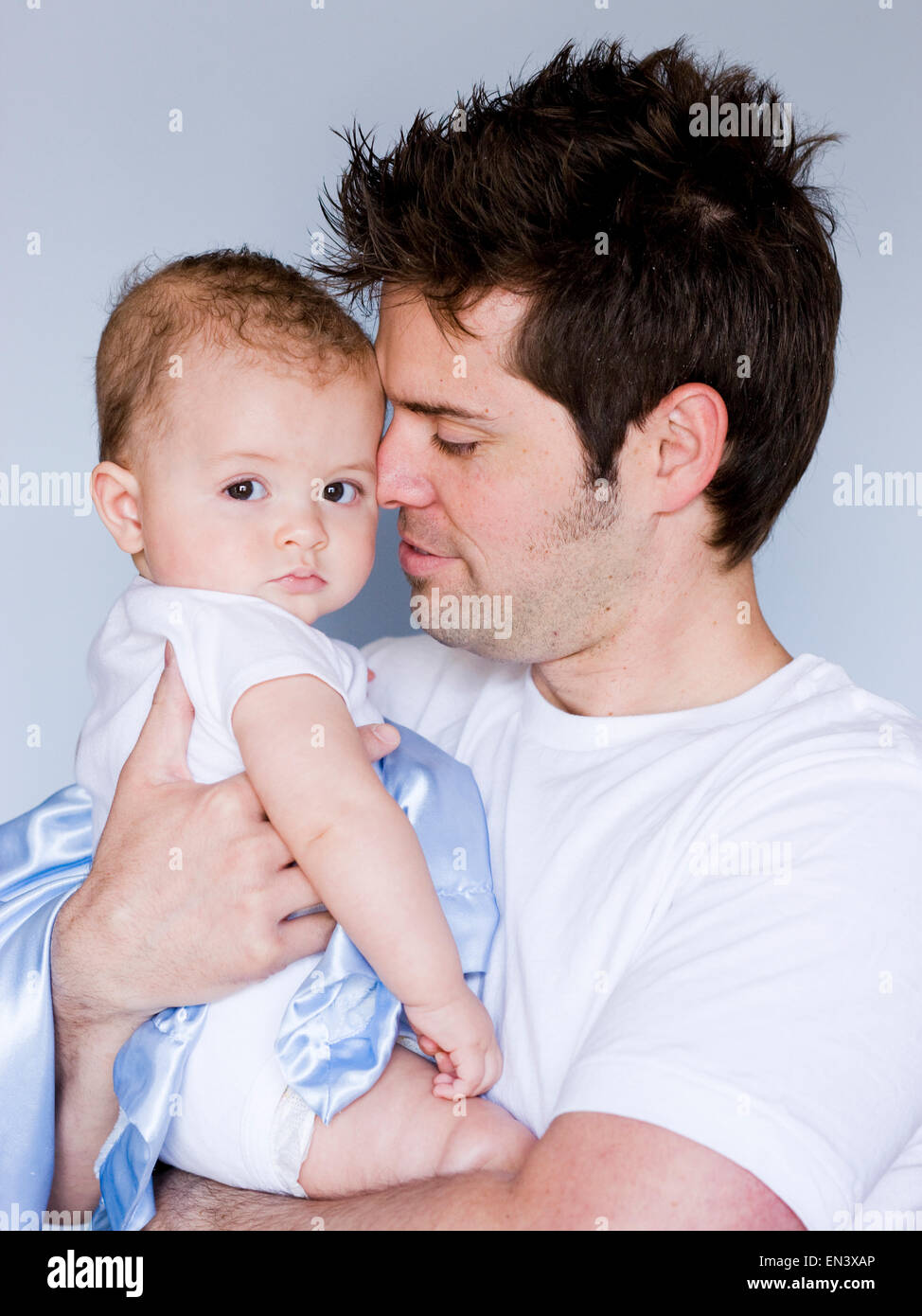 father holding baby boy Stock Photo - Alamy