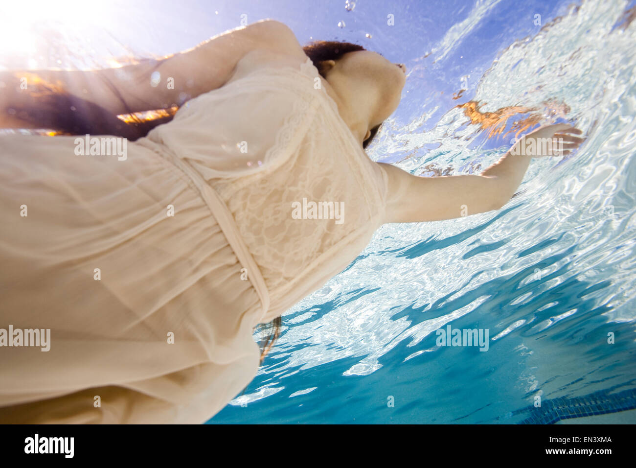 Woman in pool looking up above hi-res stock photography and images - Alamy