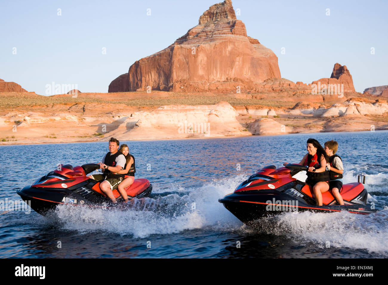 family on a wave runner Stock Photo - Alamy