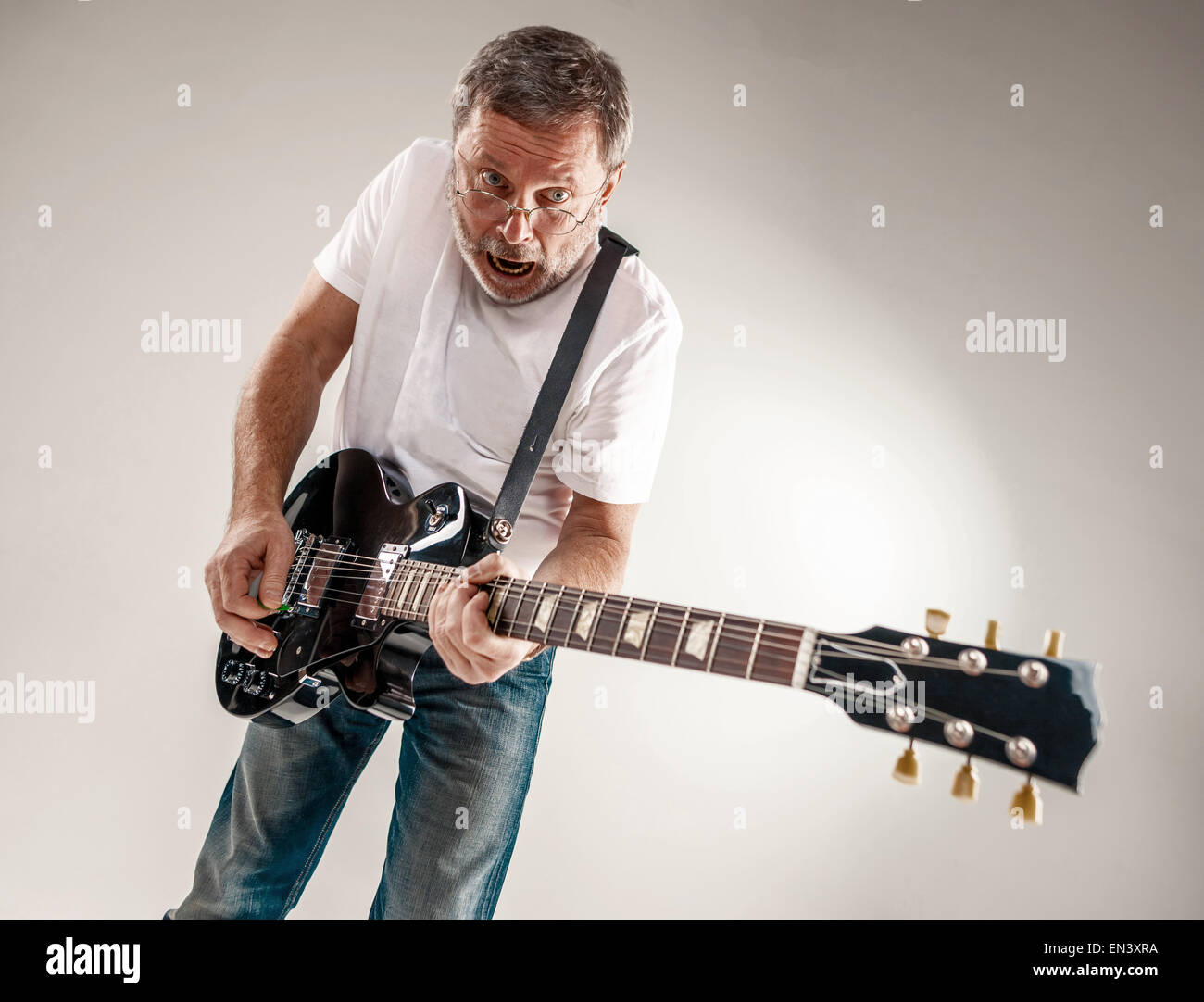 portrait of a guitar player Stock Photo - Alamy