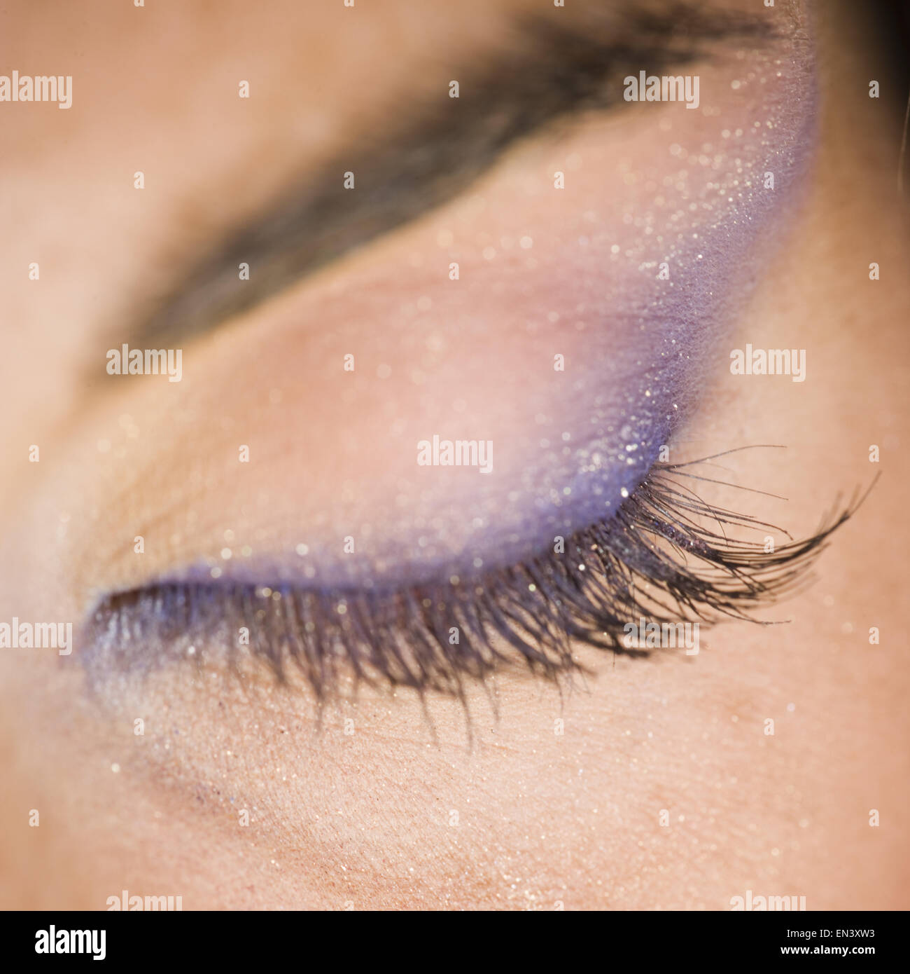 Closeup of female eye with purple eyeshadow Stock Photo - Alamy