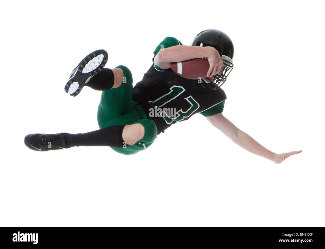 Male player of American football catching ball, studio shot Stock Photo ...