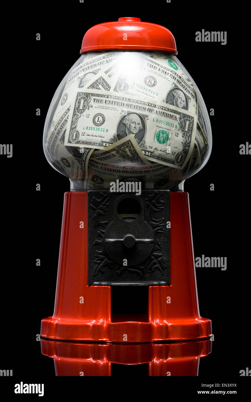 gumball machine full of money Stock Photo - Alamy