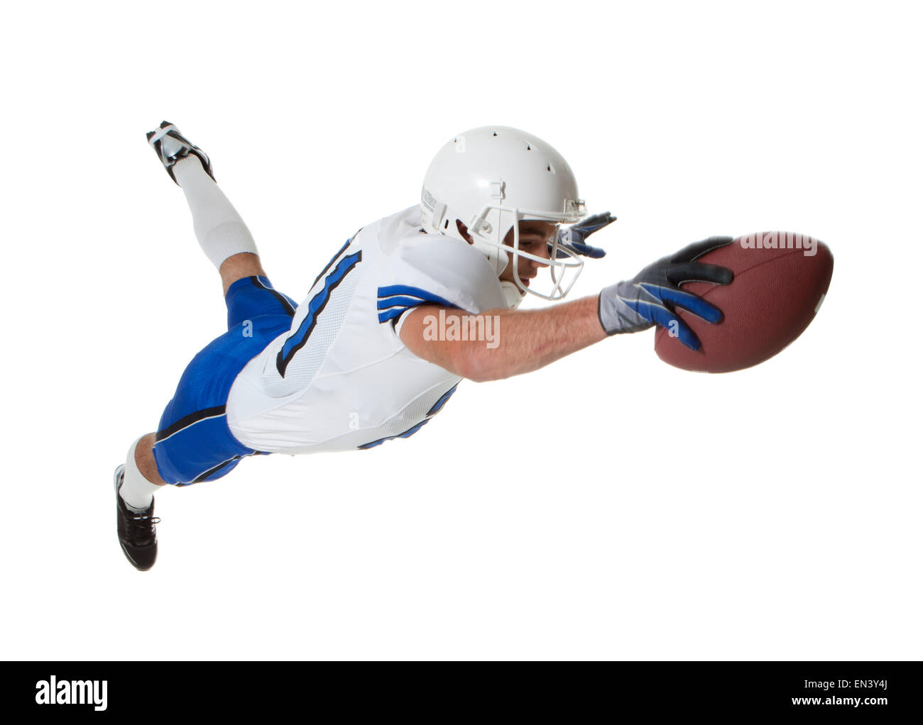 American football player catching ball hi-res stock photography and ...