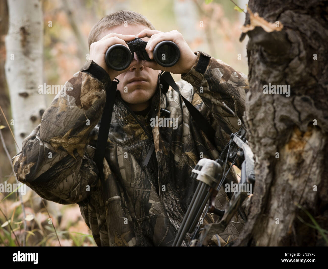 man hunting in the wilderness Stock Photo - Alamy