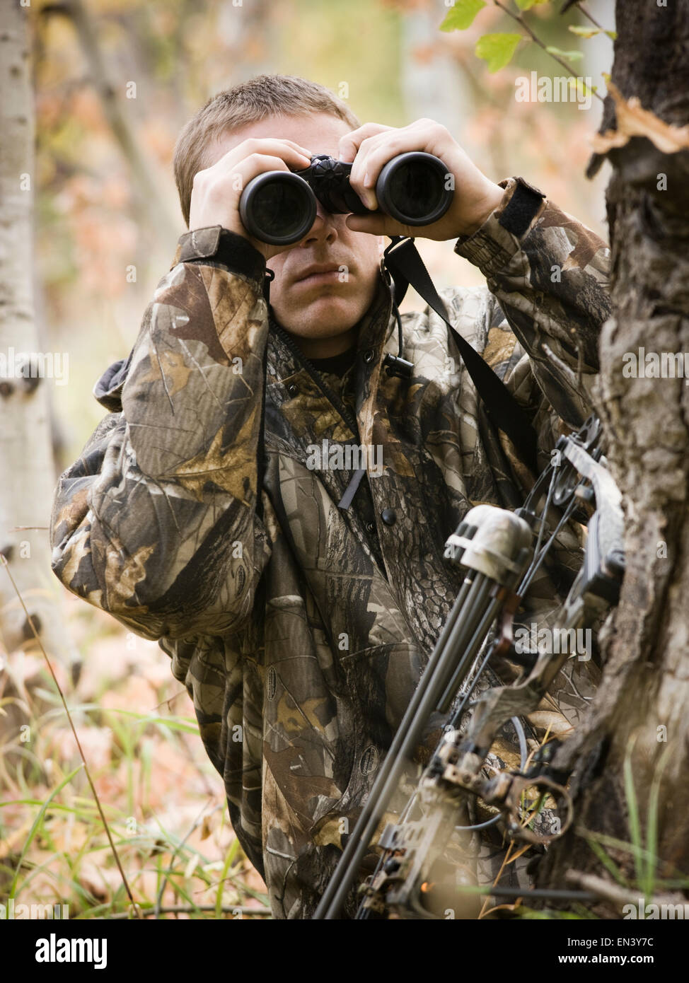 man hunting in the wilderness Stock Photo - Alamy