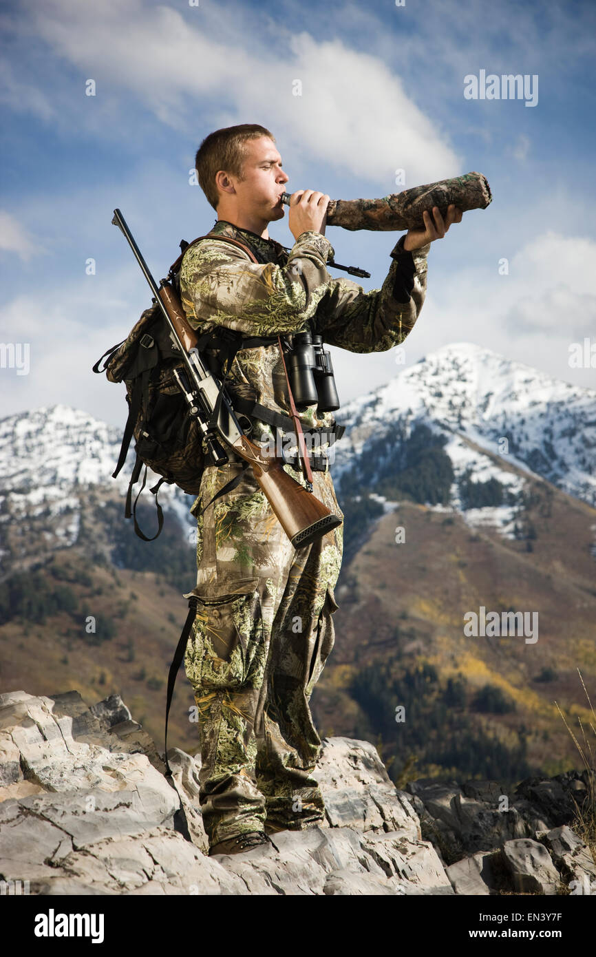 man hunting in the wilderness Stock Photo - Alamy