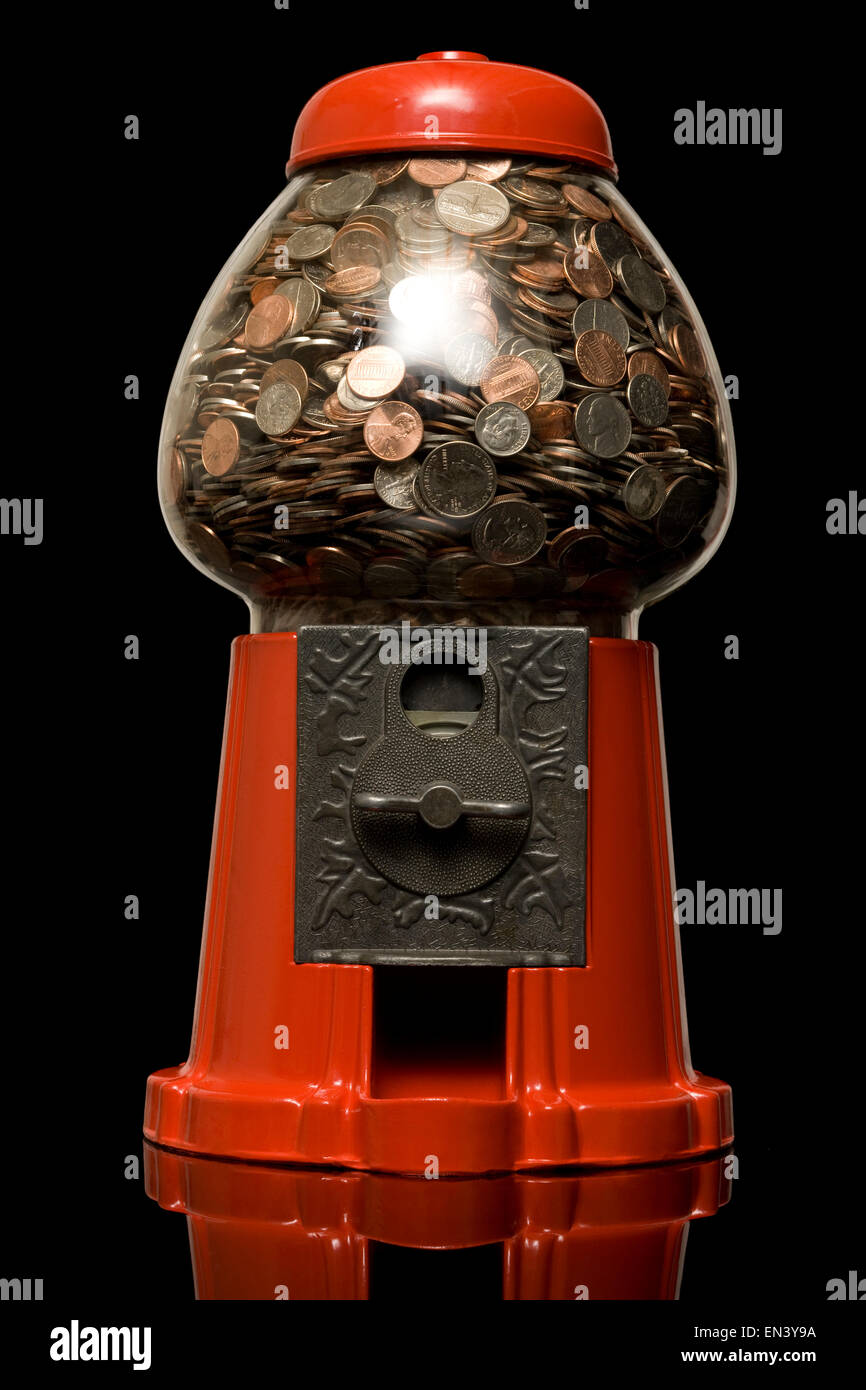 gumball machine full of money Stock Photo - Alamy