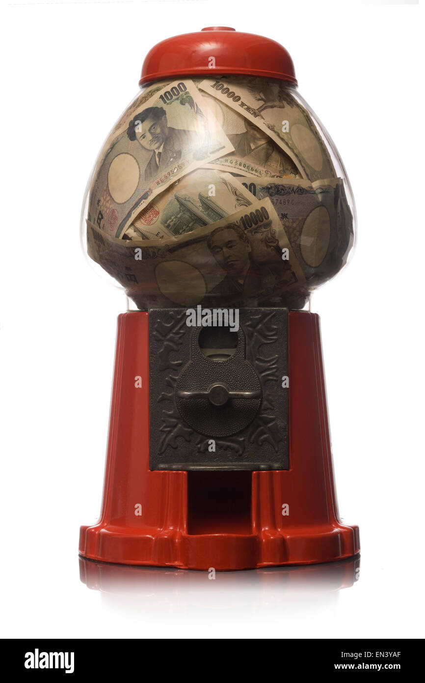 gumball machine full of money Stock Photo - Alamy