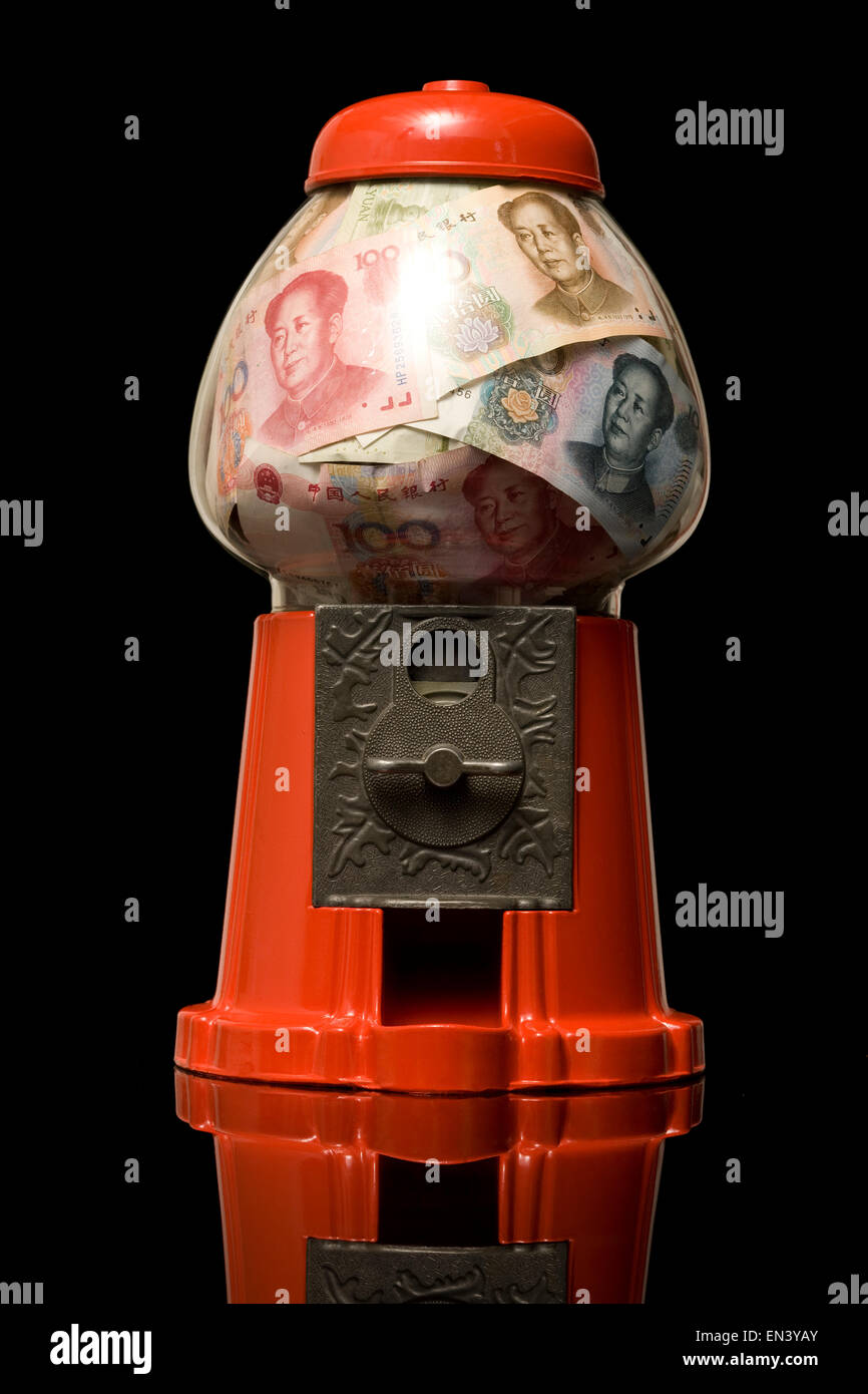 gumball machine full of money Stock Photo - Alamy
