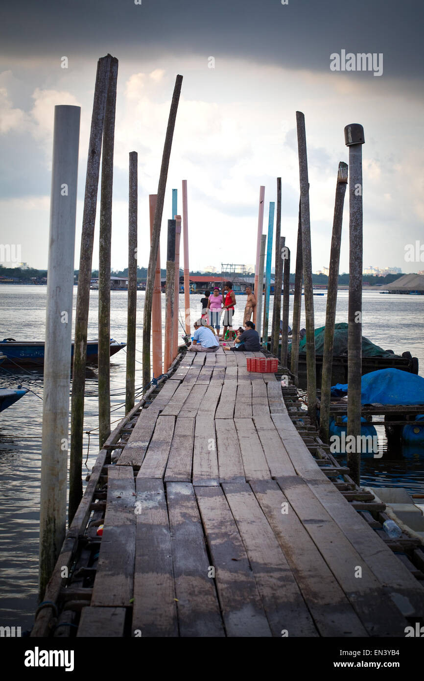 People fishing on Lim Chu Kang jetty in north Singapore, Singapore ...