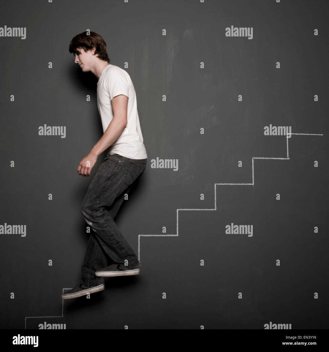 Man climbing chalk stairs hi-res stock photography and images - Alamy