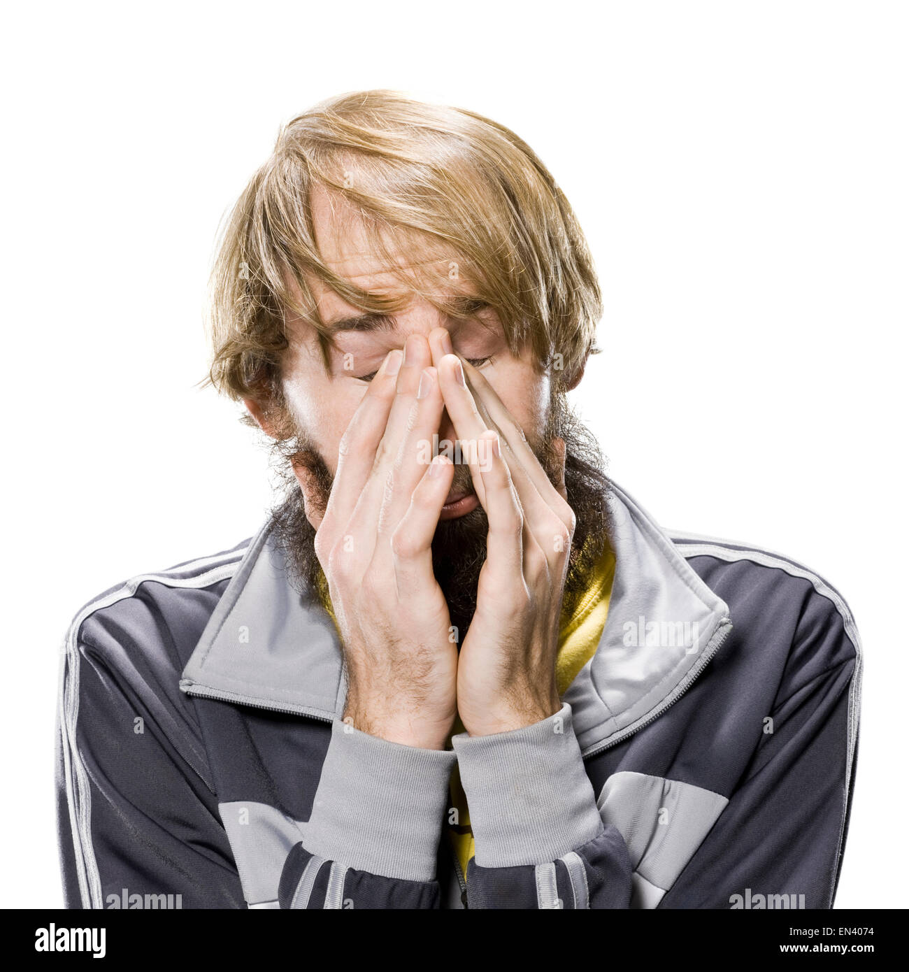 man with a beard wearing a track jacket Stock Photo - Alamy