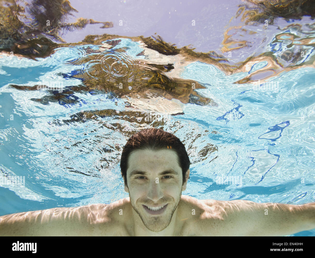 Man smiling underwater underwater view hi-res stock photography and ...