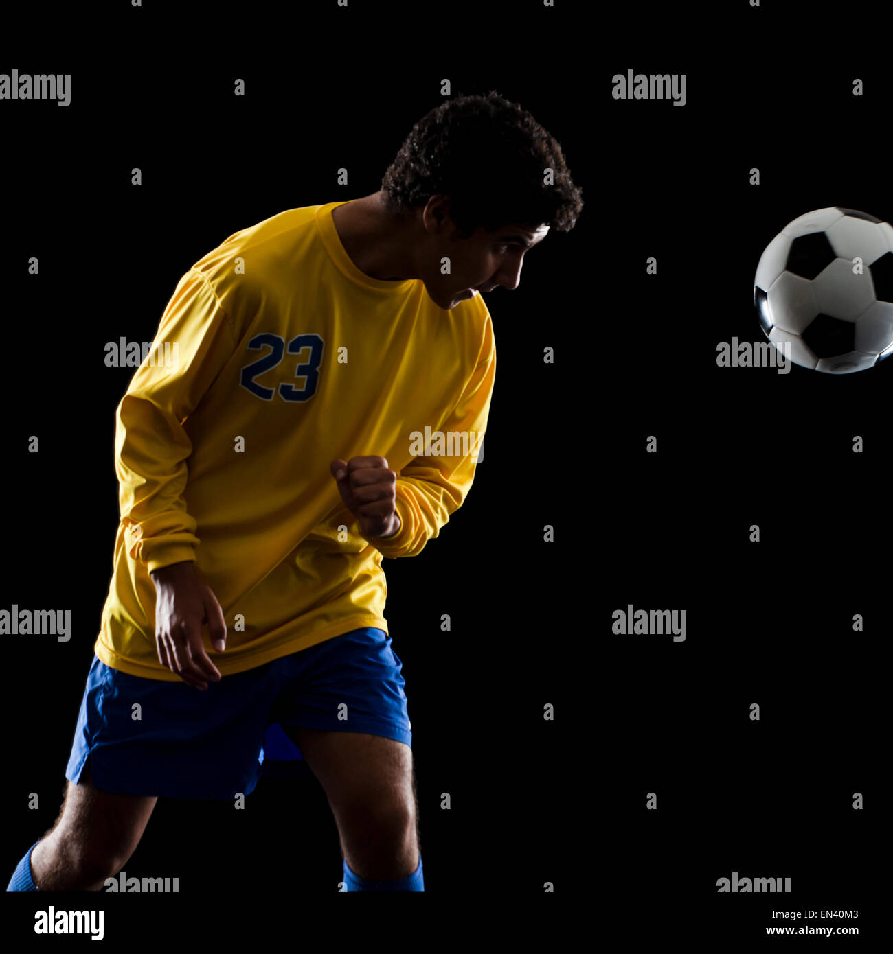Boys football heading ball hi-res stock photography and images - Alamy