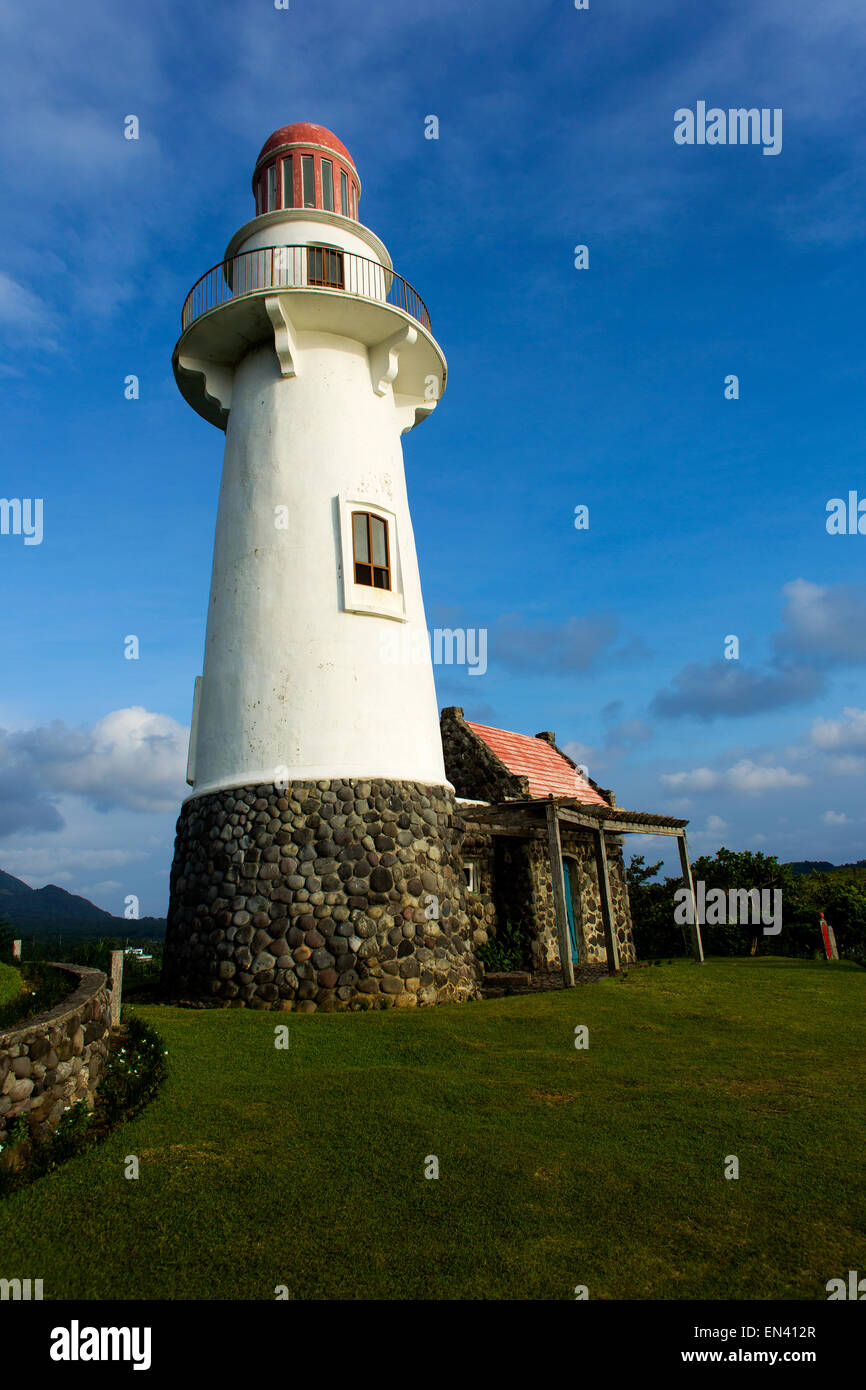 A lighthouse stands tall on the island of Batan, province of Batanes ...