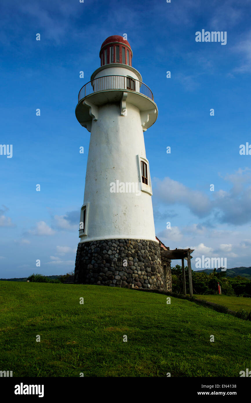 A lighthouse stands tall on the island of Batan, province of Batanes ...