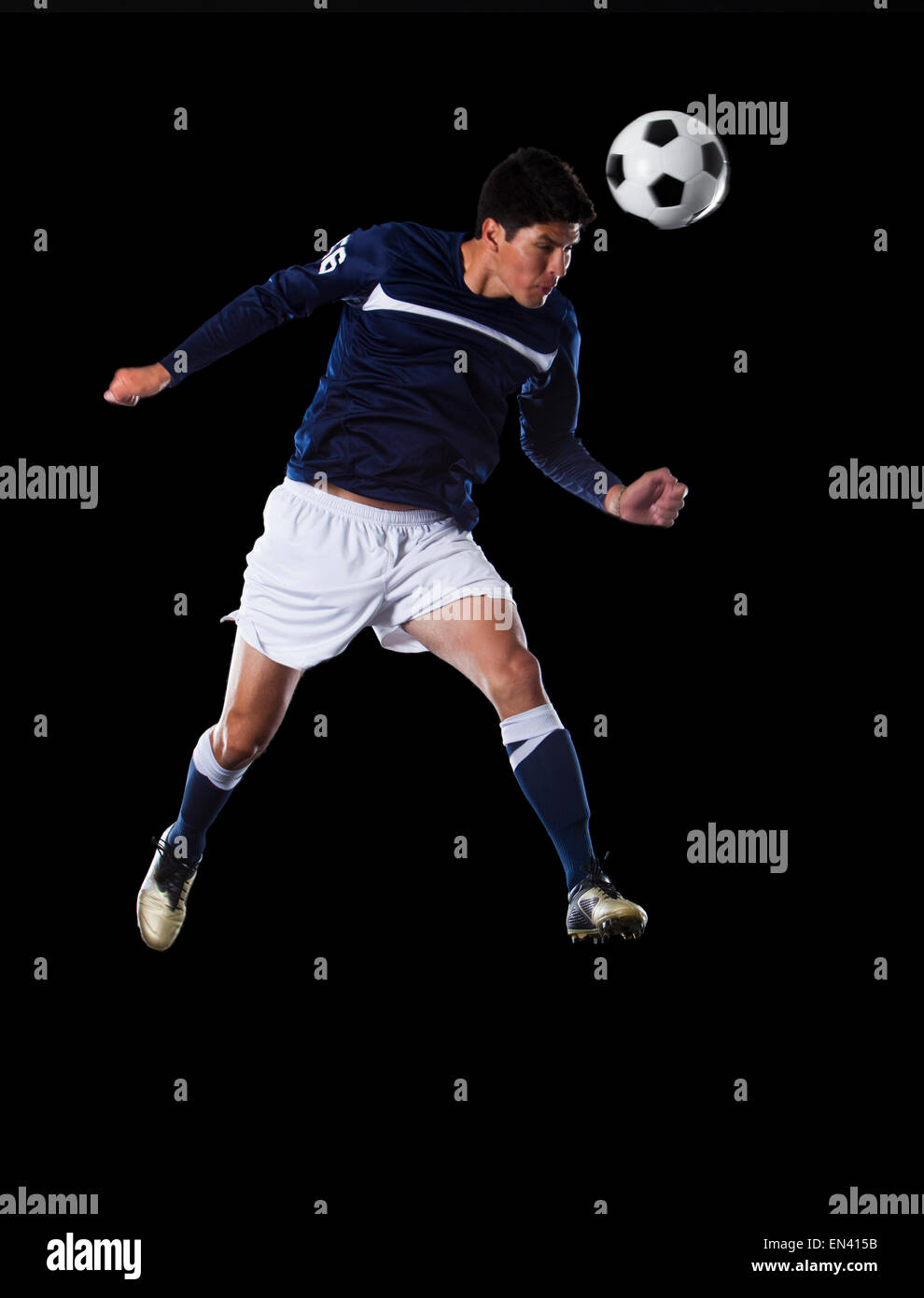 Soccer player heading the ball Stock Photo - Alamy