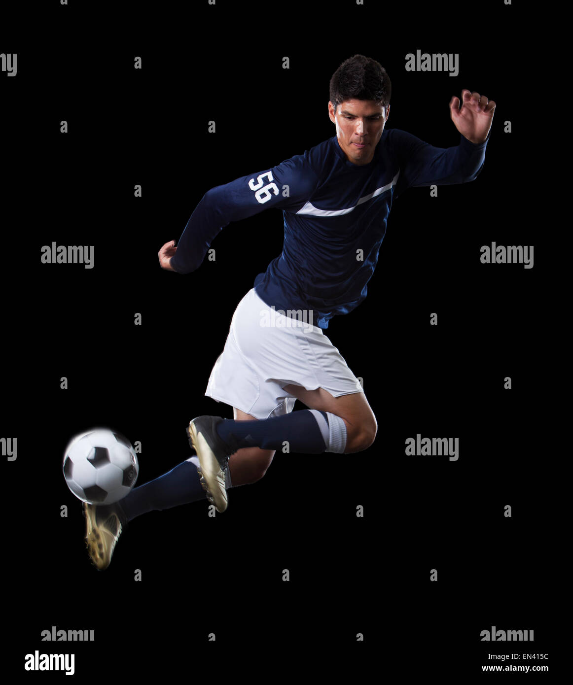 Man playing soccer Stock Photo - Alamy