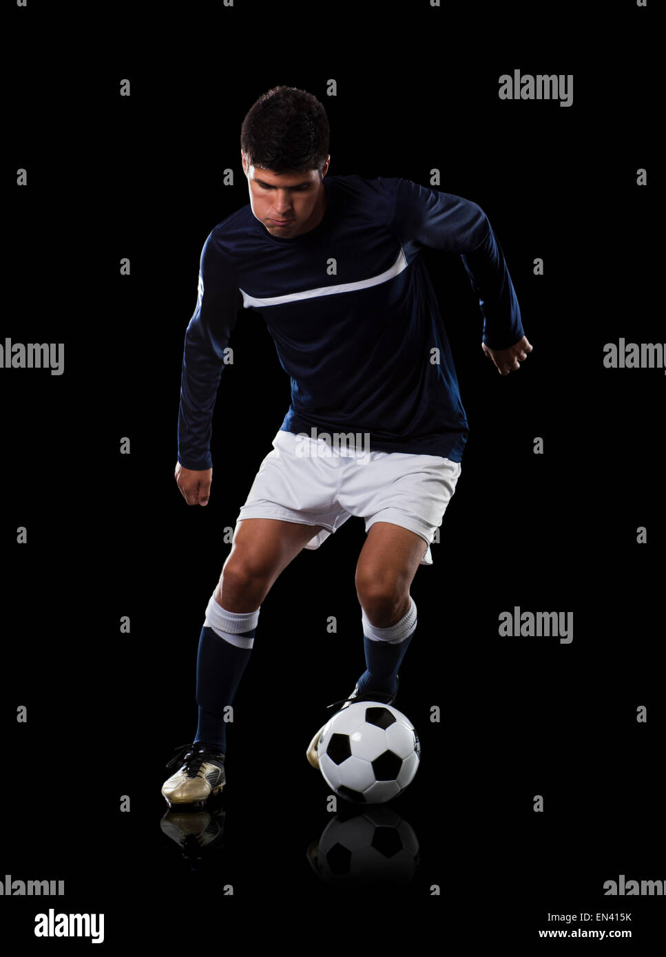 man playing soccer Stock Photo - Alamy