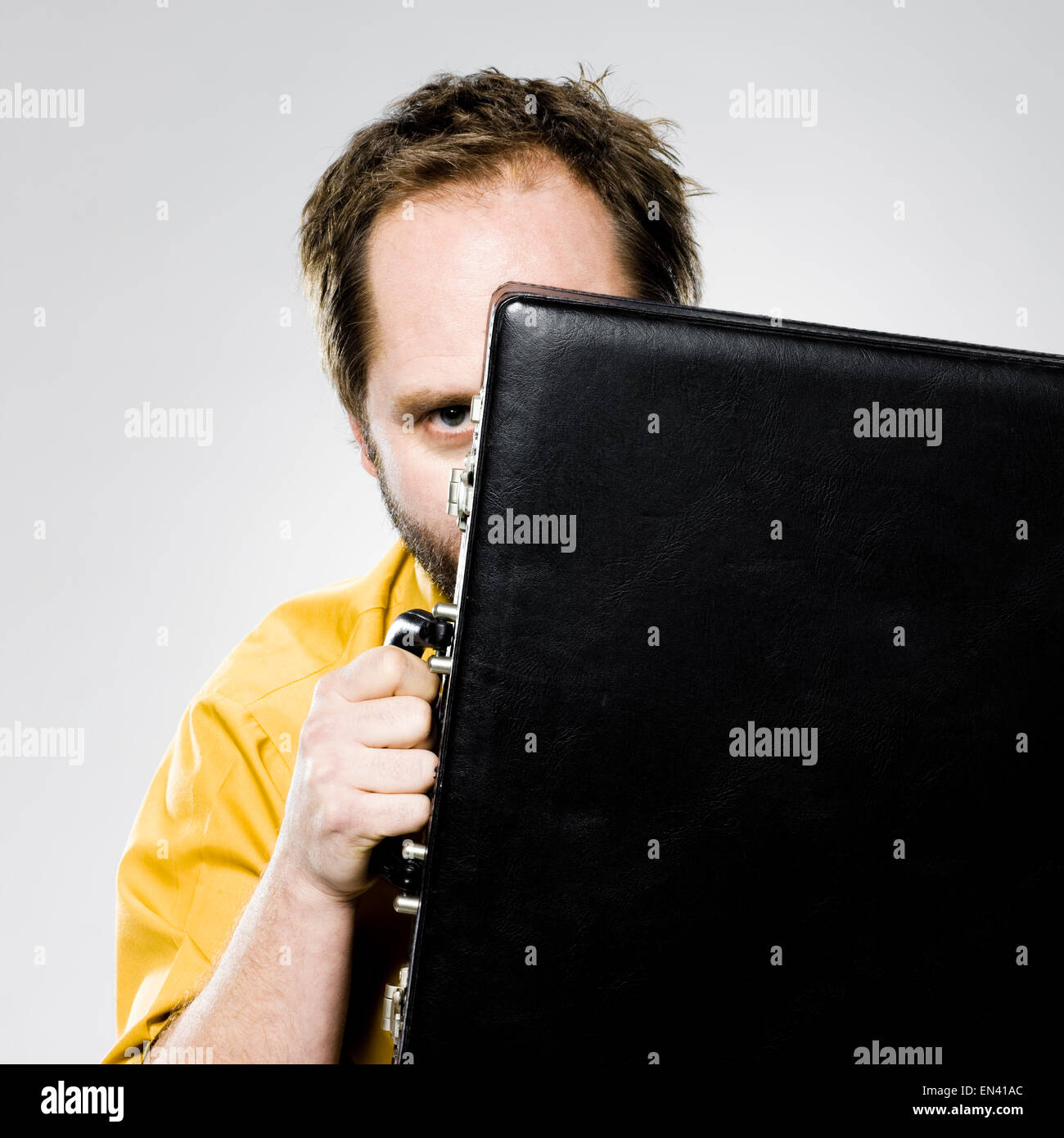 Man scared hiding hi-res stock photography and images - Alamy