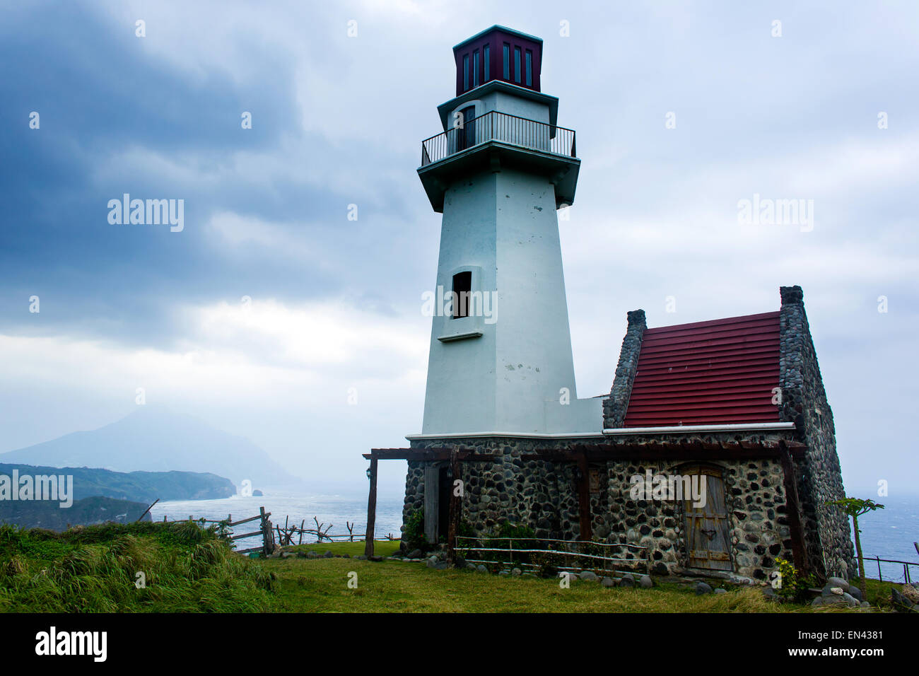 A lighthouse overlooks the shore on the island of Sabtang, province of ...