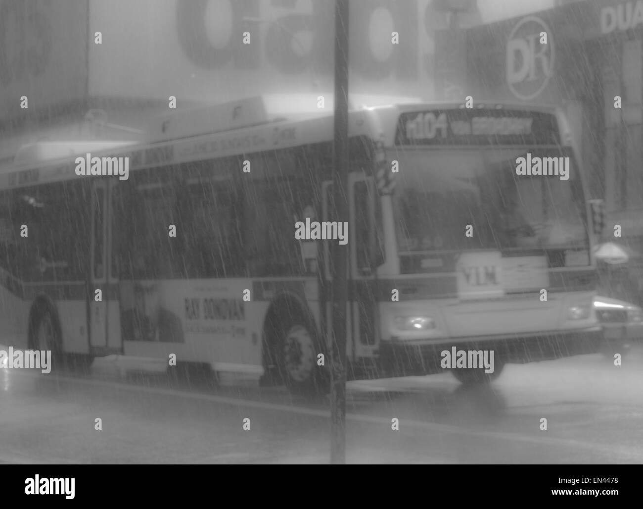 B&W moving city bus Stock Photo - Alamy