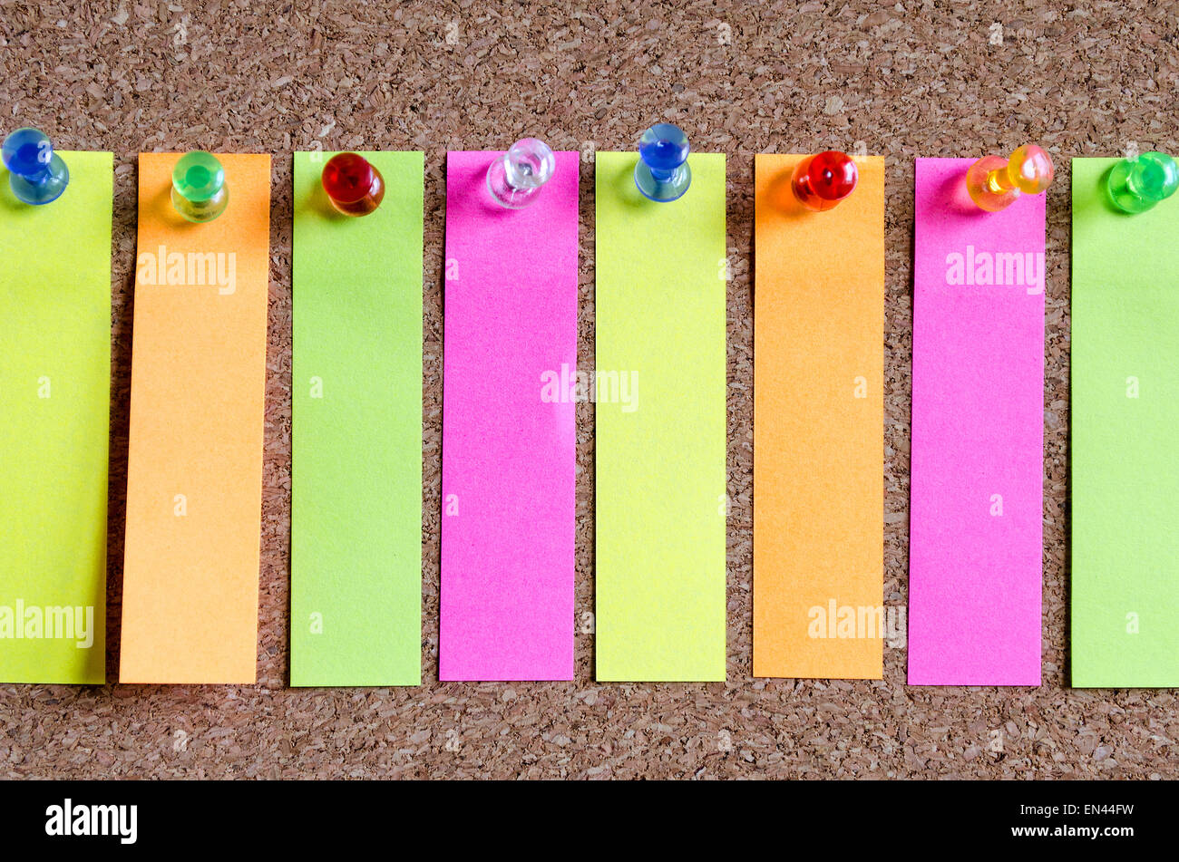 Colorful sticky notes on cork board background Stock Photo - Alamy