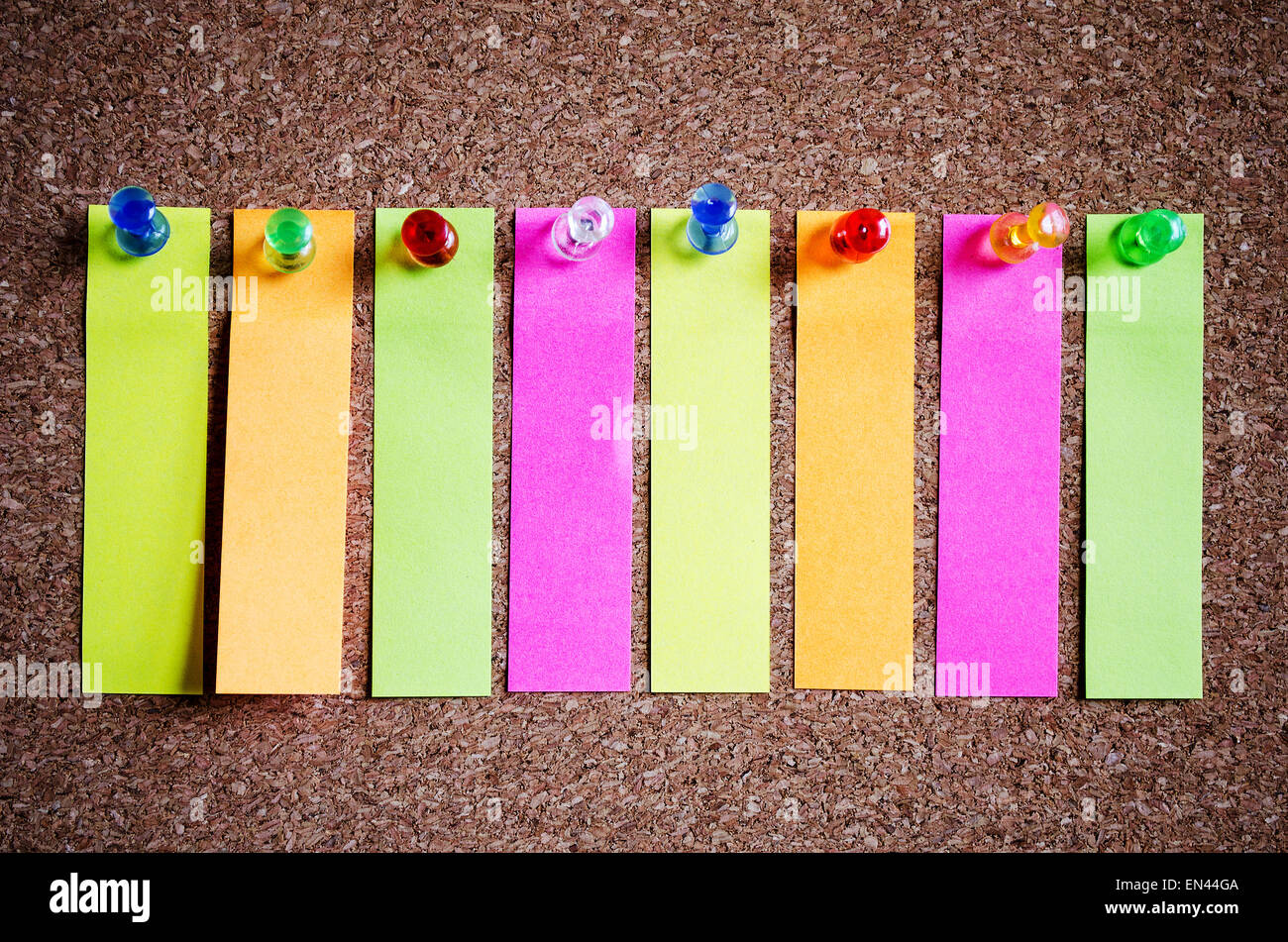 Colorful sticky notes on cork board background Stock Photo - Alamy