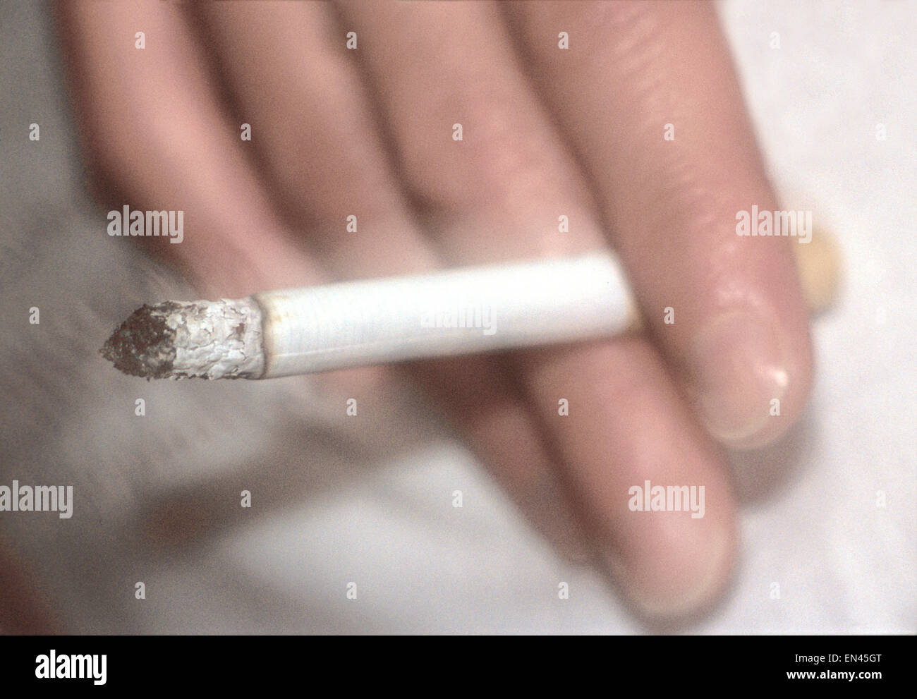 Cigarette hand female hi-res stock photography and images - Alamy