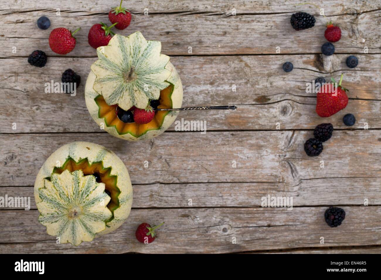 Melons Filled With Fruit Salad Stock Photo - Alamy
