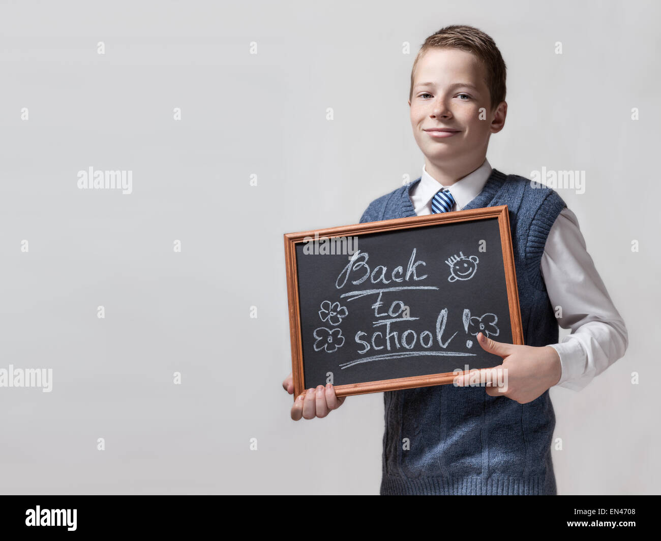 Smart school uniform boy smiling hi-res stock photography and images ...