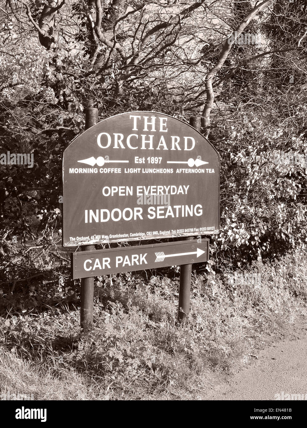Roadside sign to The Orchard pub in Grantchester near the Meadows, used ...