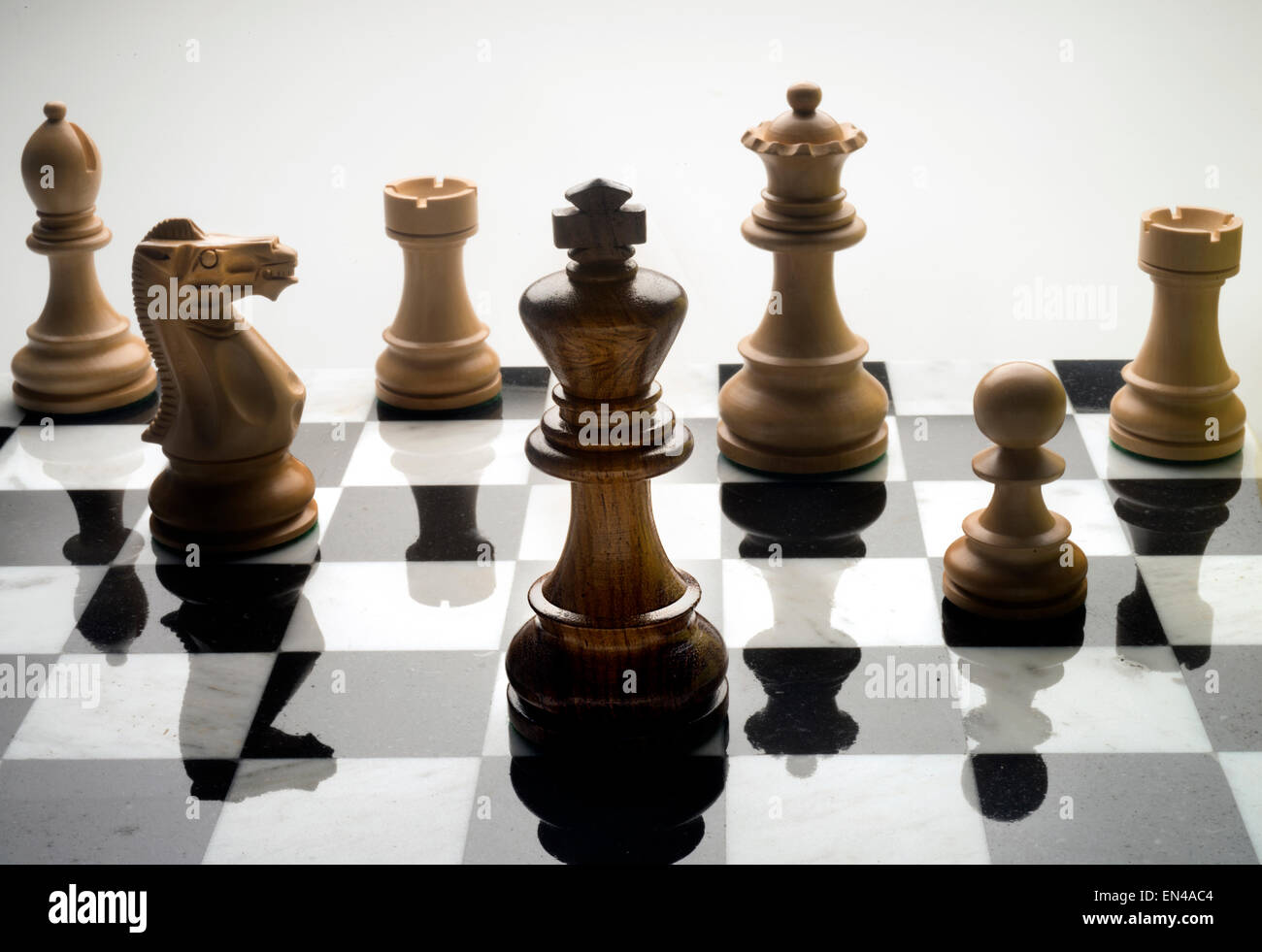 Chess pieces game board background hi-res stock photography and images ...